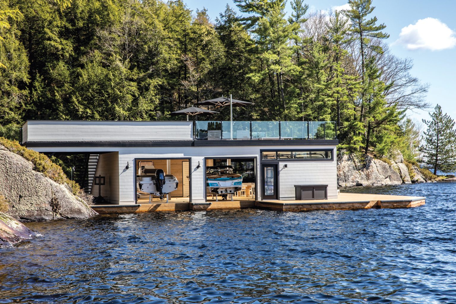 Platform boat lifts reflect the elegance of modern boathouses ...