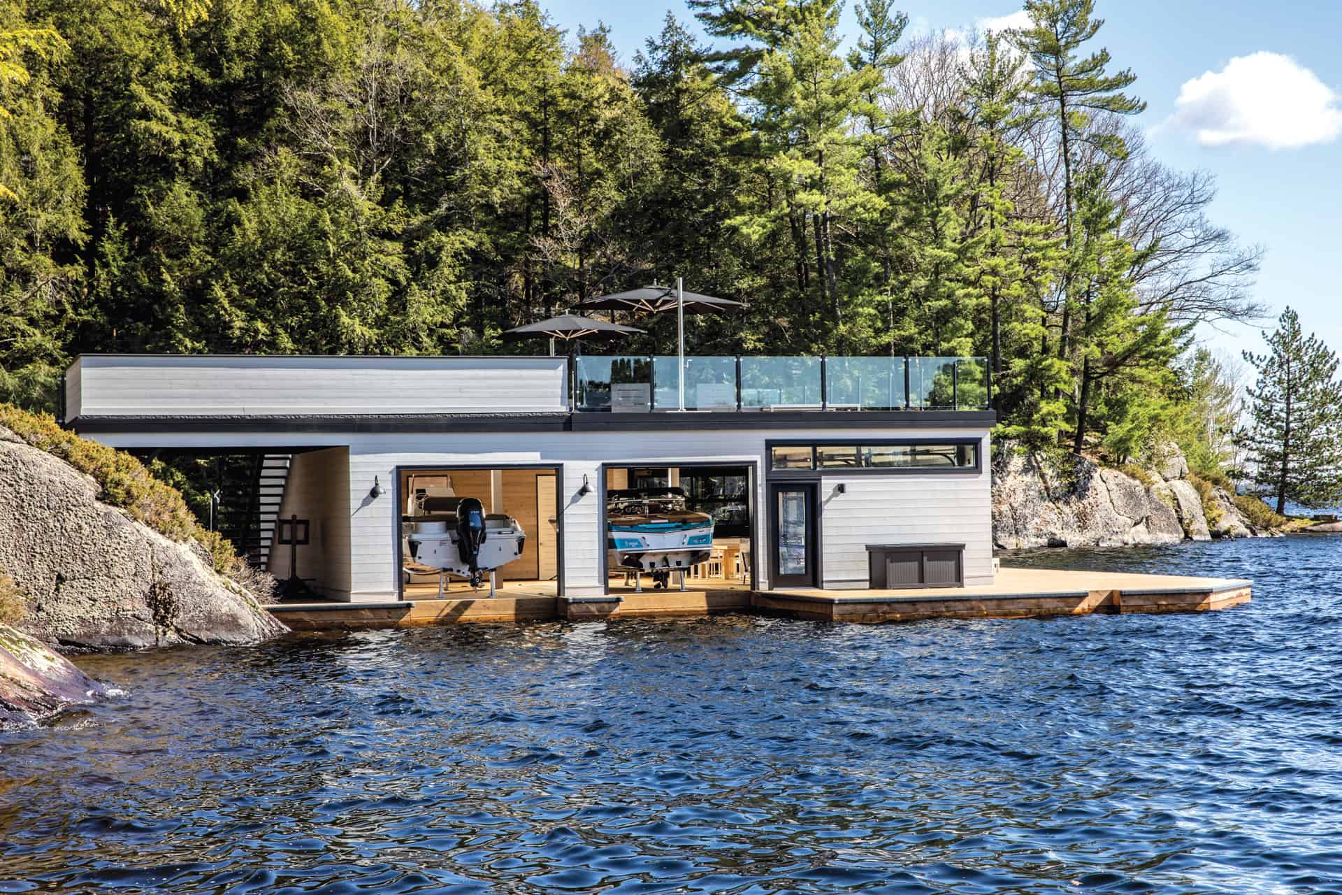 Platform boat lifts reflect the elegance of modern boathouses ...